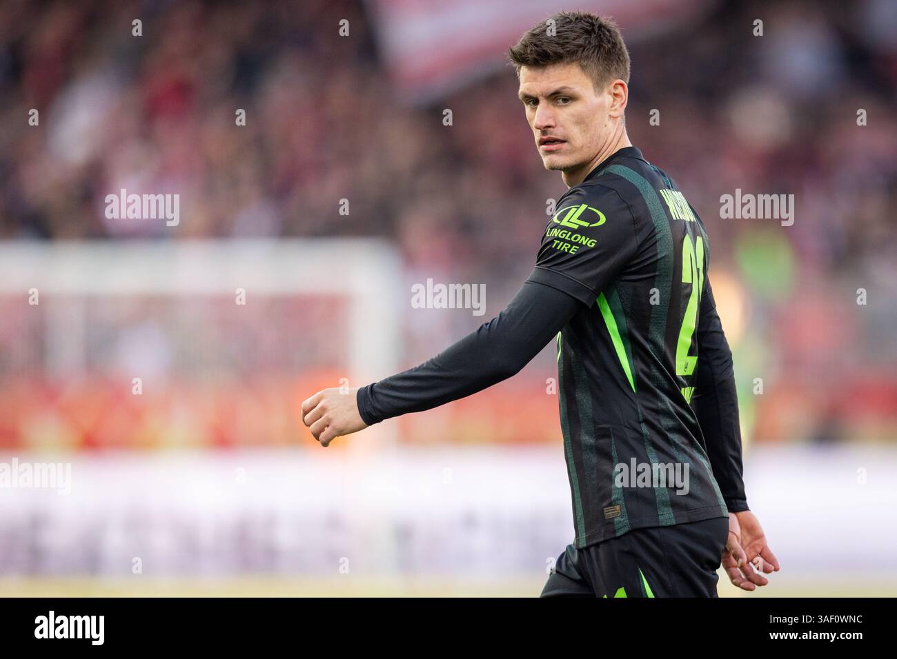 Berlin, Germany. 06th Apr, 2025. Joakim Maehle (21) of Wolfsburg seen ...