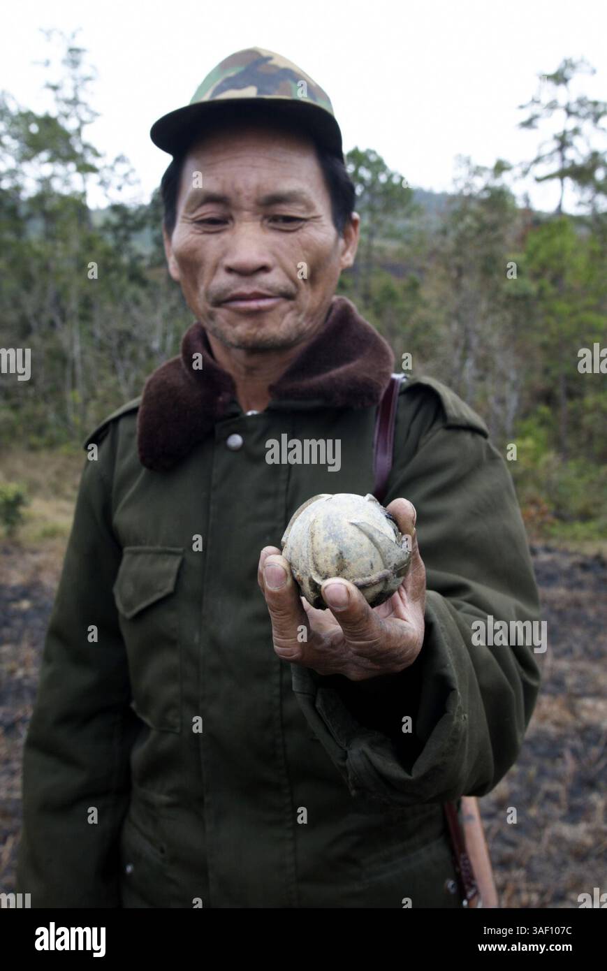 Feb 12, 2003; Phonsavan, Xieng Khuang, LAOS; General GAY LAW, 62, a ...