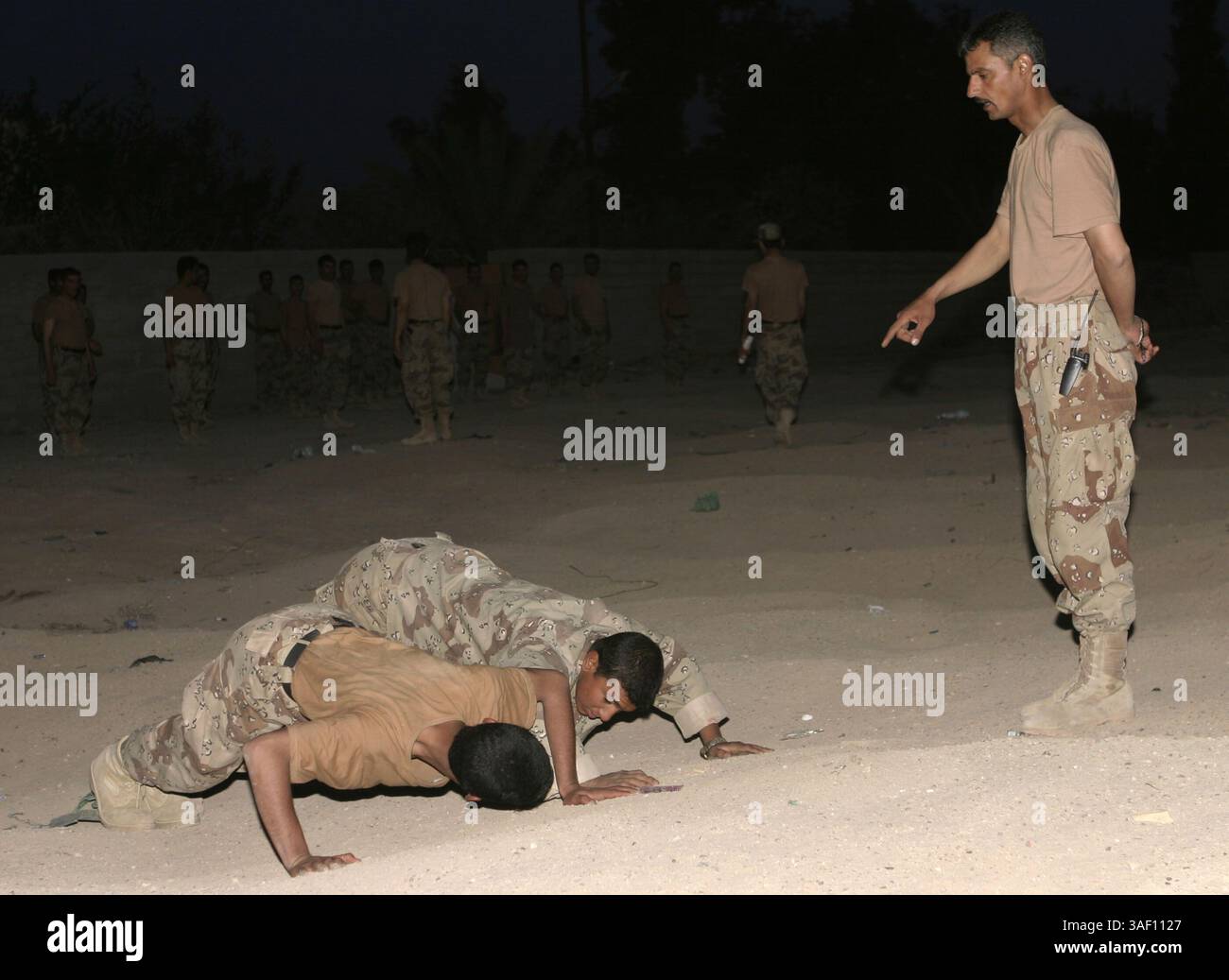 Apr 10, 2005; Fallujah, Iraq; An Iraqi troop leader ÒmotivatesÓ his ...