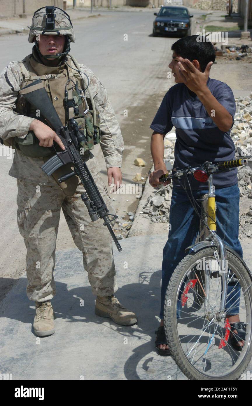 Apr 11, 2005; Ar Ramadi, Iraq; Corporal MICHAEL J. KELLY, a team leader ...