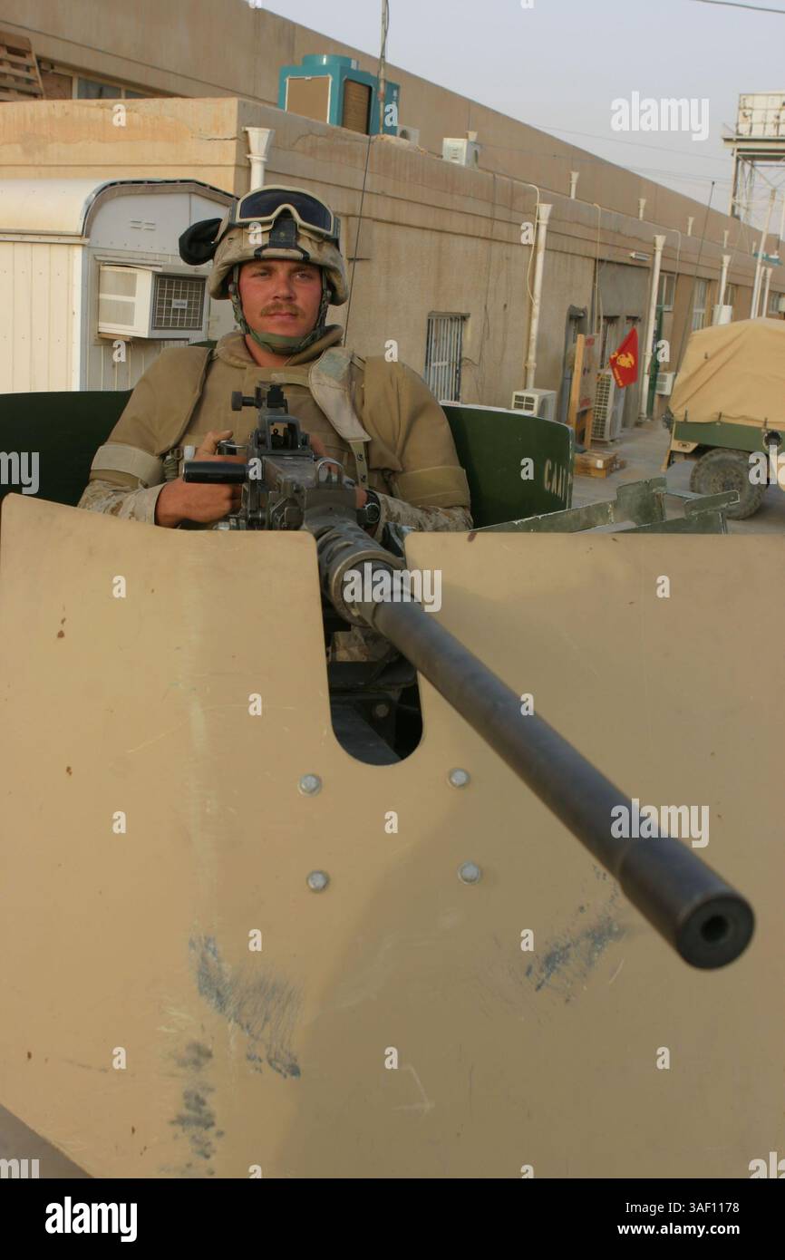 Apr 09, 2005; Camp Al Qa'im, Iraq; Cpl. ROBERT L. GASS, a tow gunner ...