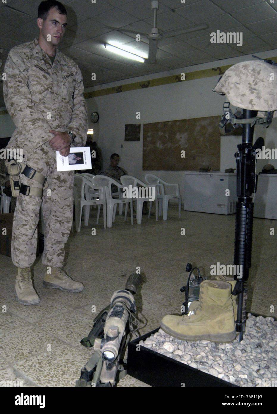 Apr 30, 2005; Fallujah, Iraq; Saying his final farewell to a fallen ...