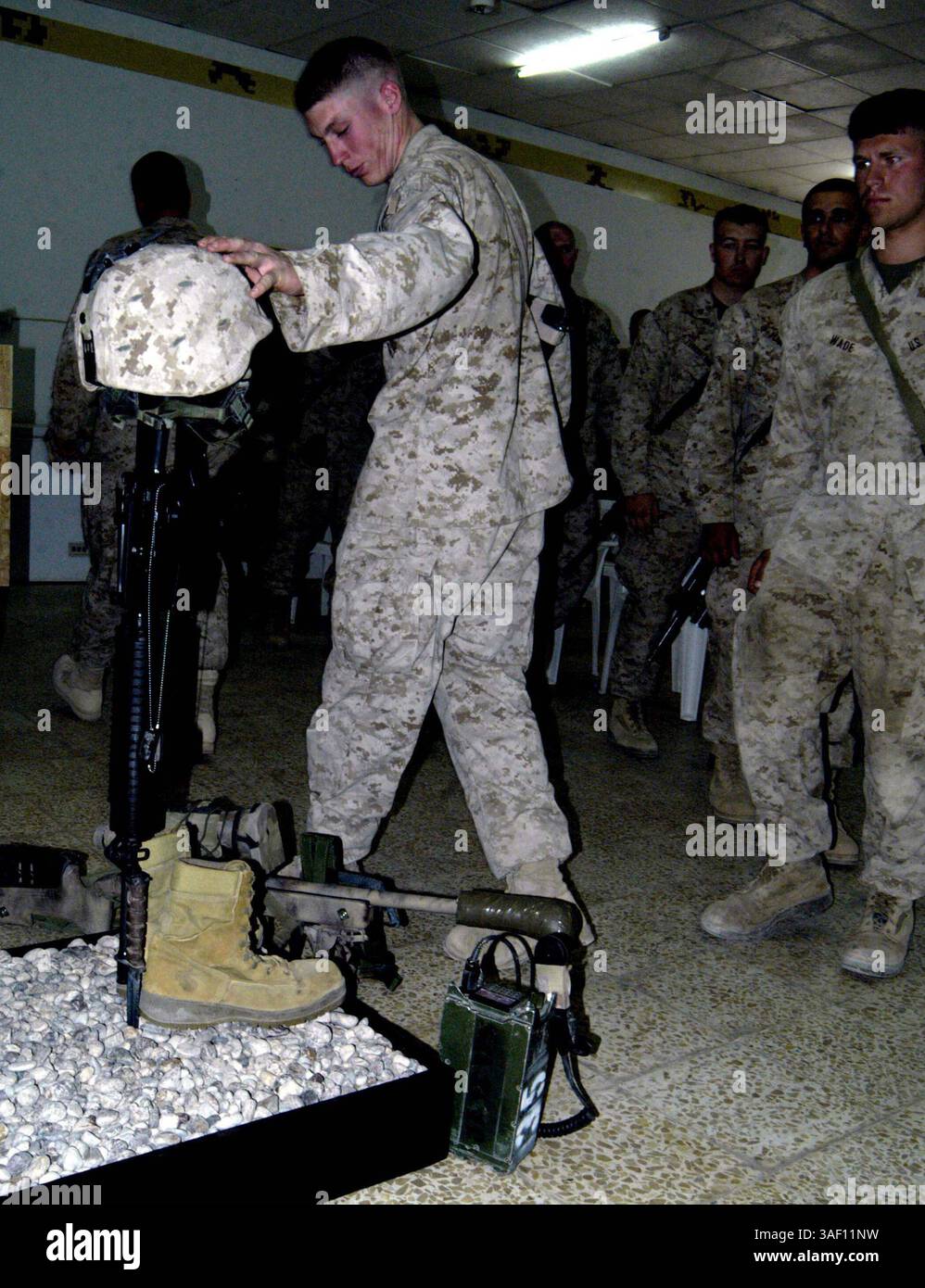 Apr 30, 2005; Fallujah, Iraq; Marines line up to pay their last ...