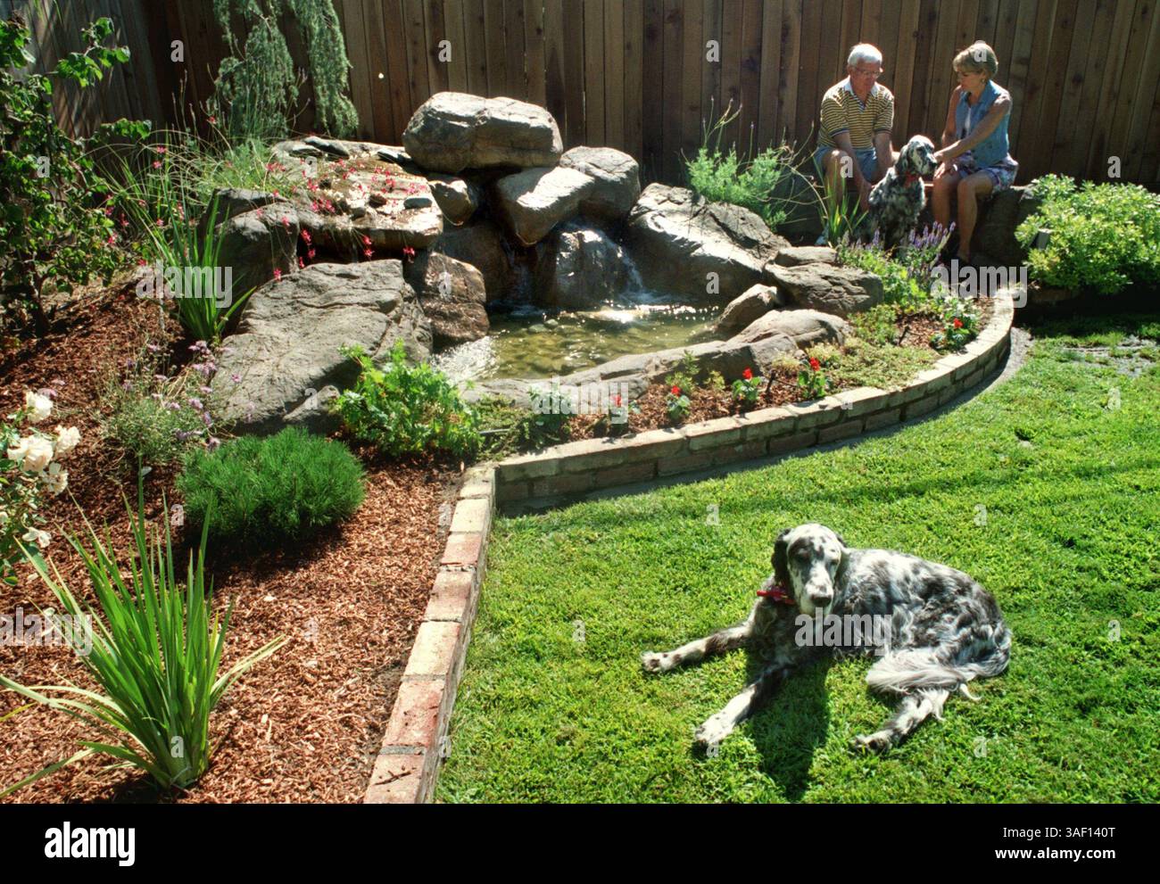 Dewey and Brenda Willis, Carmichael, relax by the pond in their ...