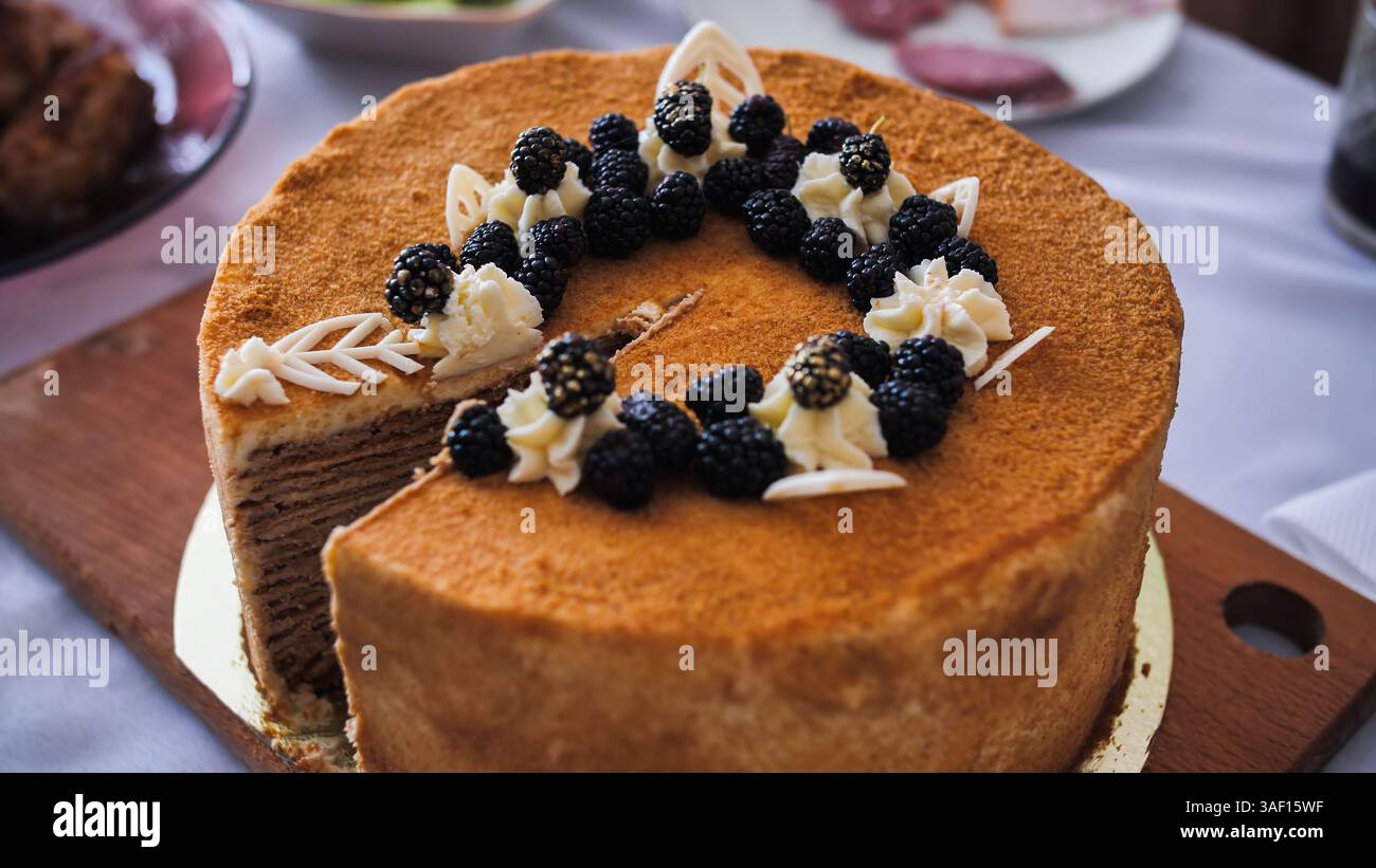 Person cuts pastry on plate hi-res stock photography and images - Alamy