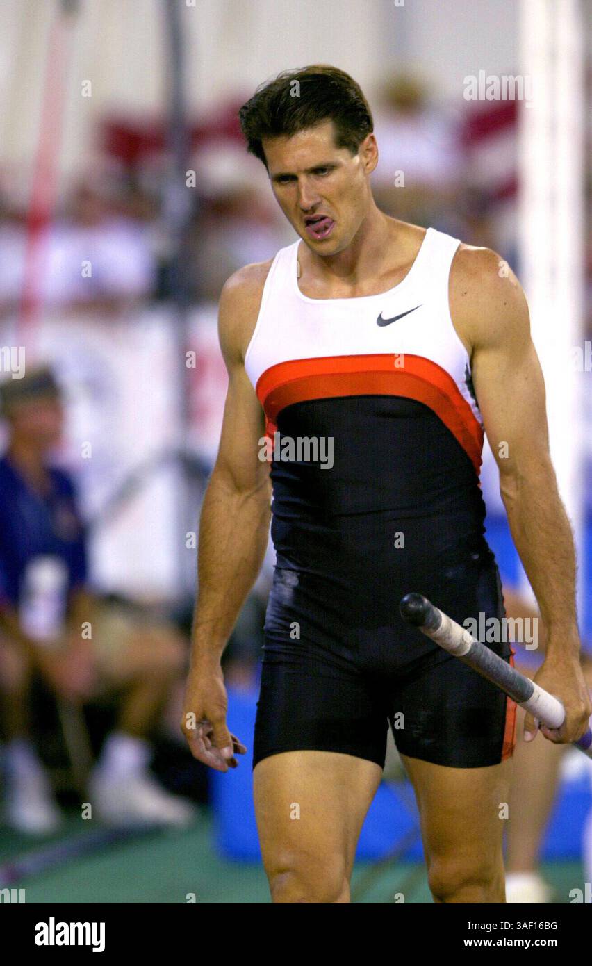 Jeff Hartwig, the American record holder in the Men's Pole Vault walks ...