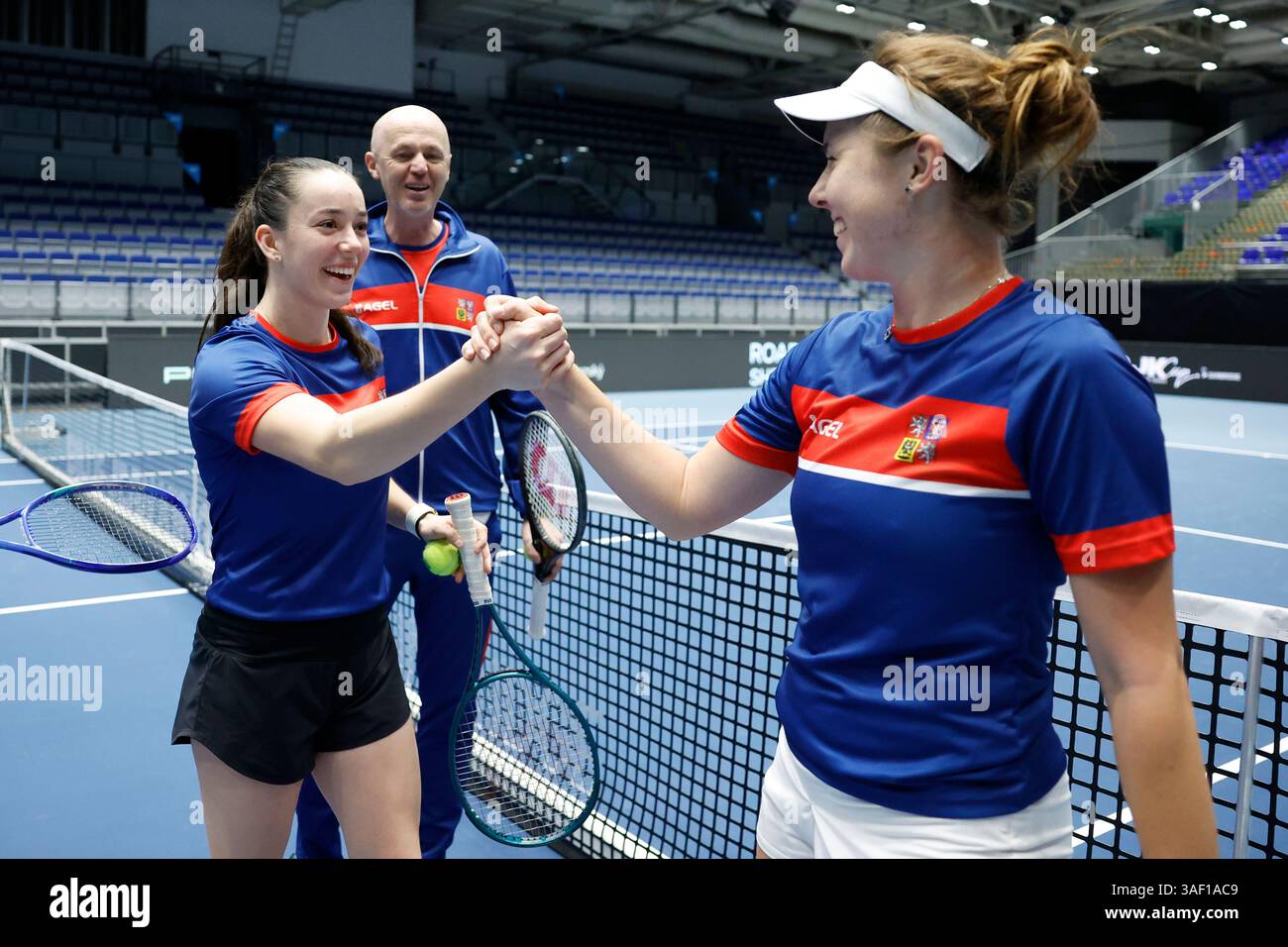 Czech tennis players Tereza Valentova (left), Linda Noskova and non ...