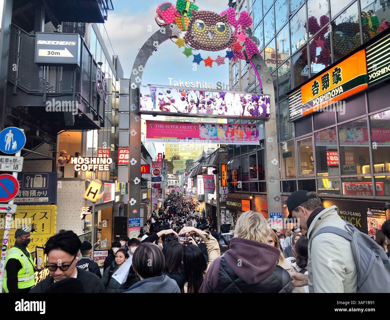 Tokyo, Japan - March 19, 2023: people in the crowded pedestrian zone at ...