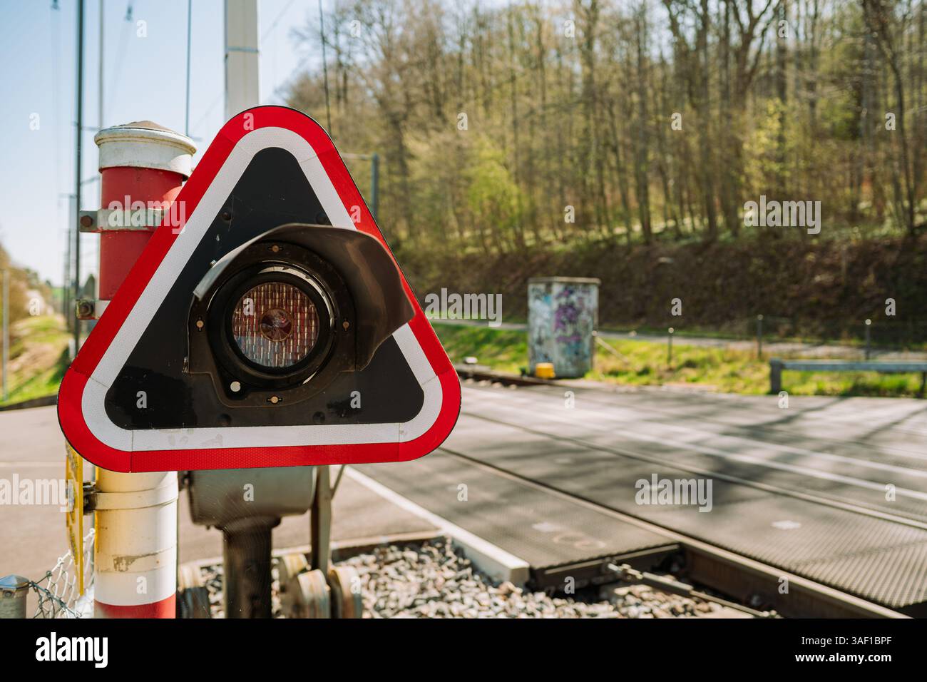 Railroad crossroad traffic signal or stop sign. Close up shot, shallow ...