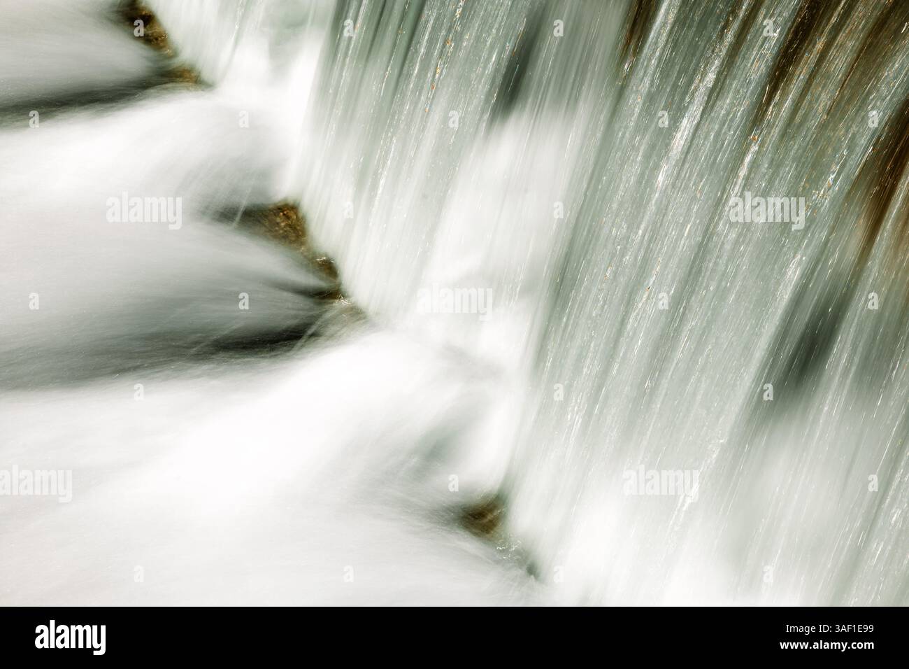 Waterfall splashing texture or background. Slow shutter speed, blurry ...