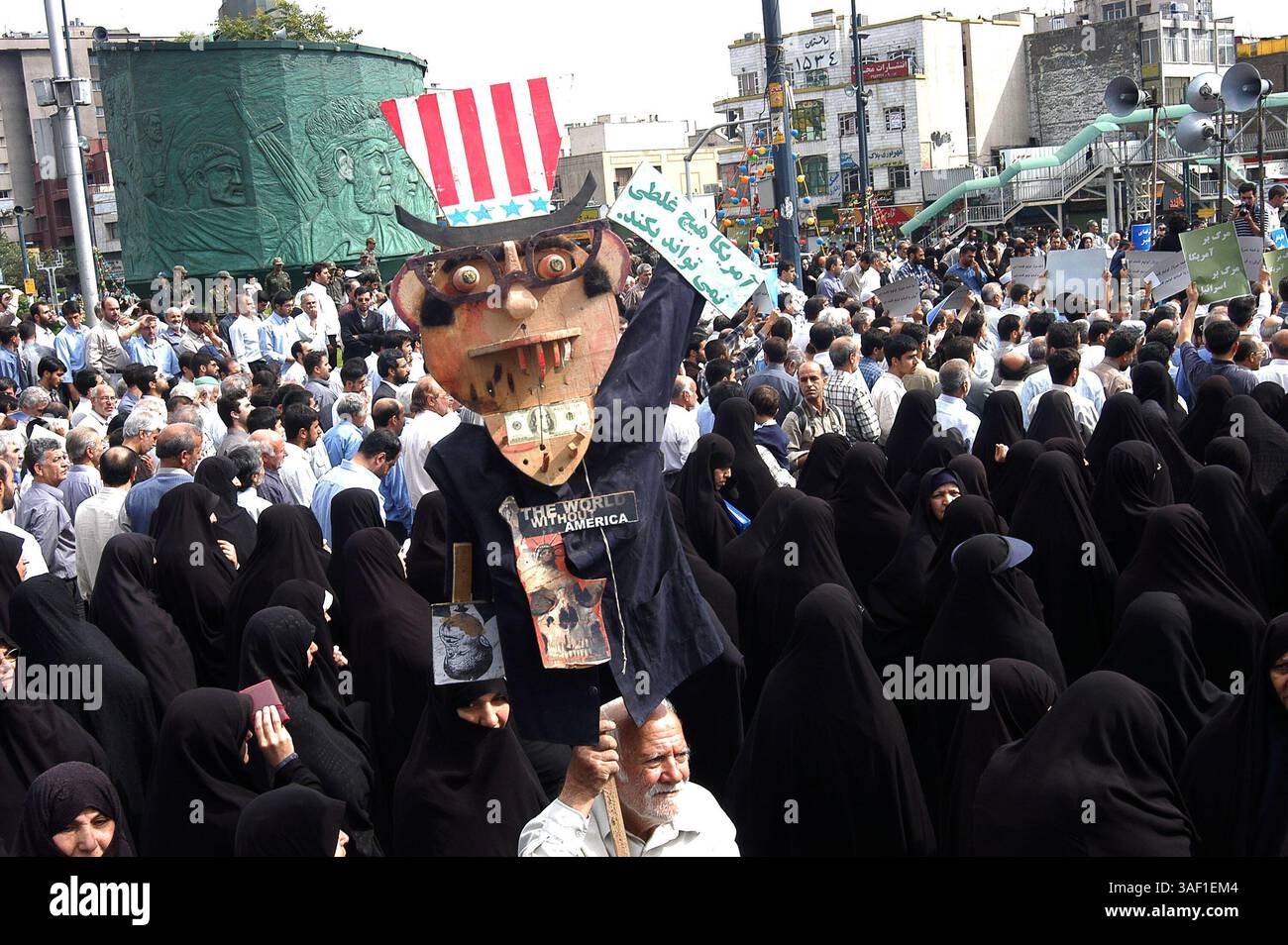 Oct 07, 2005; Tehran, IRAN; An Iranian man carries an effigy of U.S ...