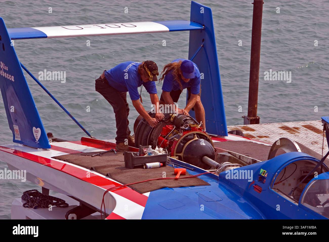 Jul 15, 2005; Detroit, Michigan, USA; Crewmen struggle to remove a ...