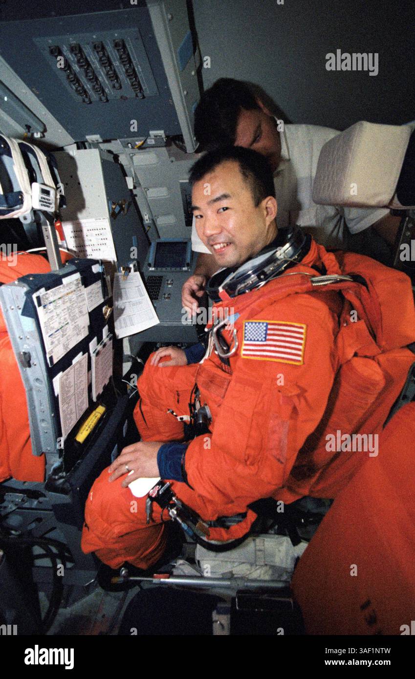 Apr 26, 2002; Houston, TX, USA; With the assistance of a training staff ...