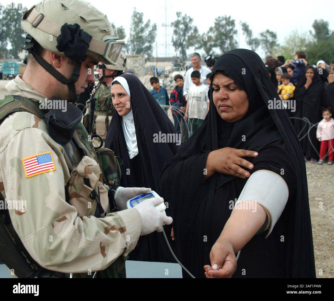 Mar 09, 2005; Karkh, Baghdad, Iraq; Specialist James Hanson, a medic ...
