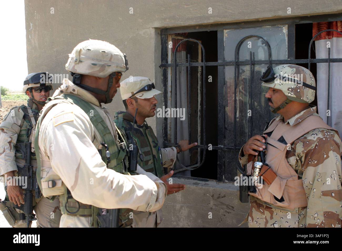 Jun 25, 2005; Tunis, Iraq; Sgt. 1st Class Randy D. Horton (left ...