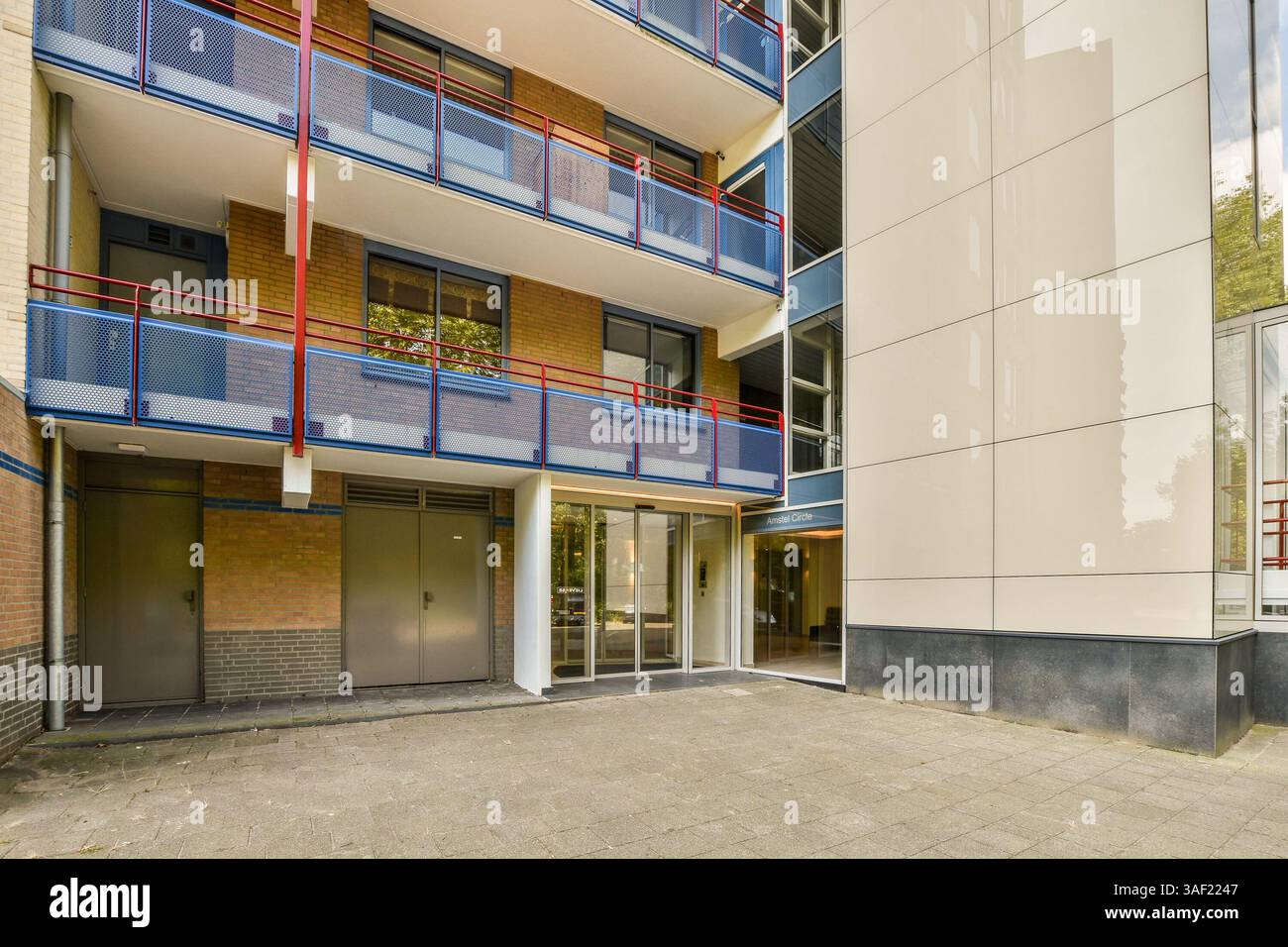 A detailed view of a modern building showcasing its stylish facade and ...