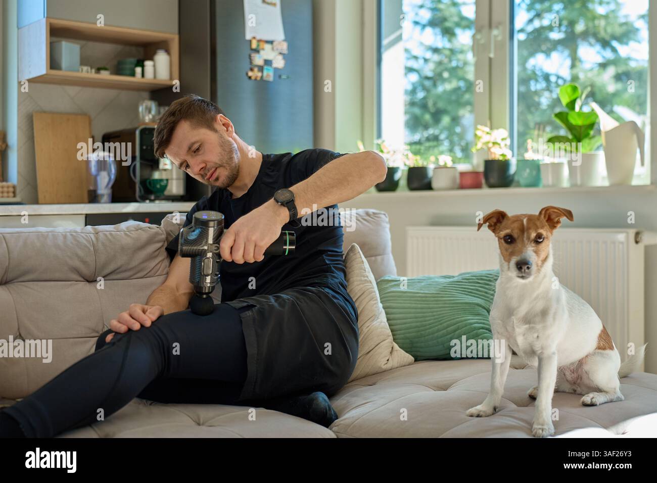 Close-up of man recovery muscle after training, massaging legs with ...