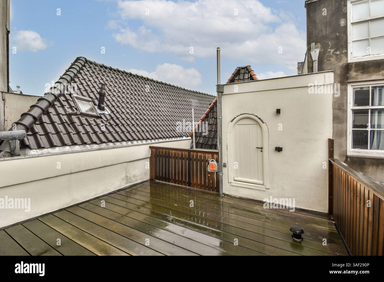 A stylish modern rooftop terrace featuring wooden flooring and rooftop ...