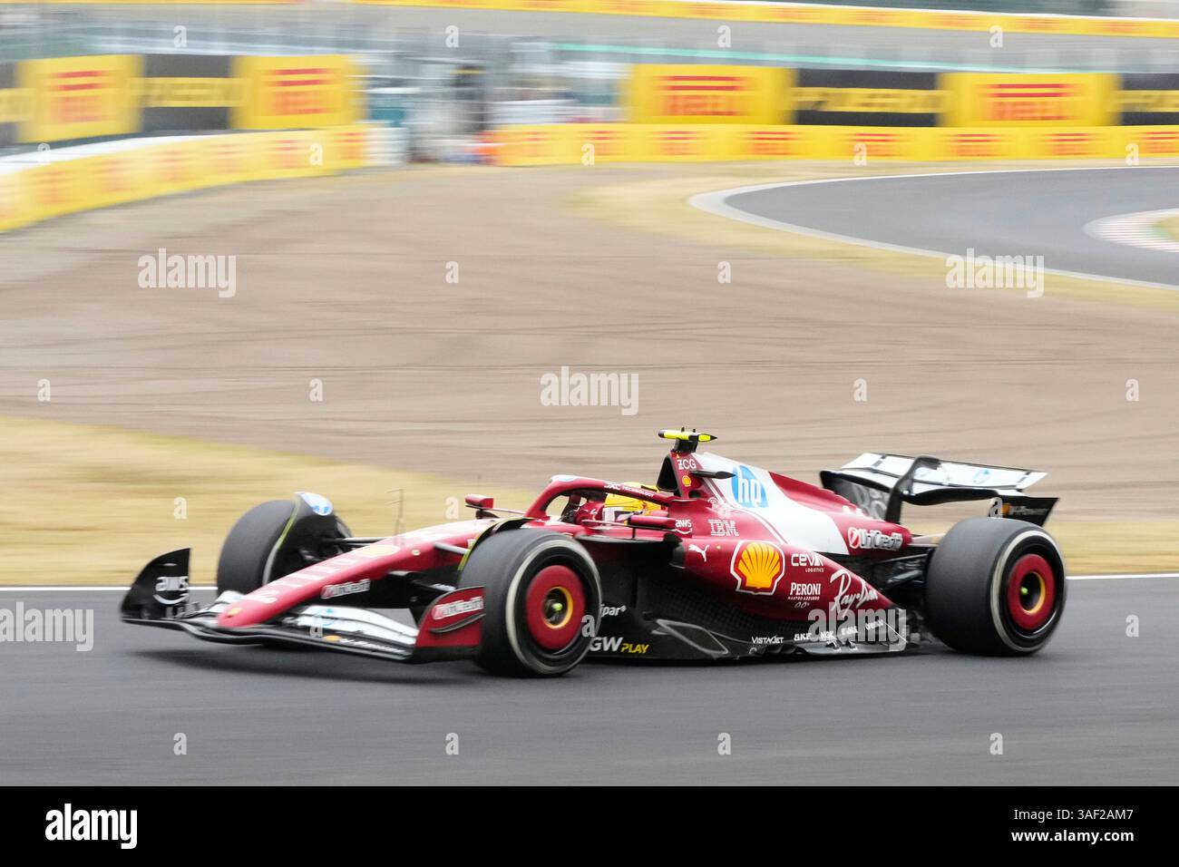 Ferrari driver Lewis Hamilton of Britain steers his car during the ...