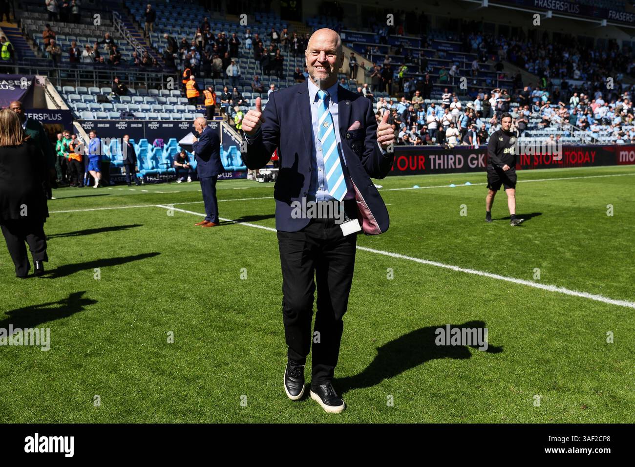 Former Coventry City player Dave Busst on the pitch at half time during ...