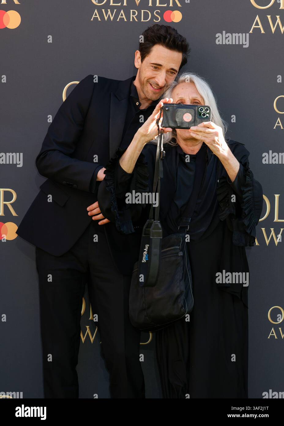 London, UK. 06th Apr, 2025. Adrien Brody and Sylvia Plachy attend the ...