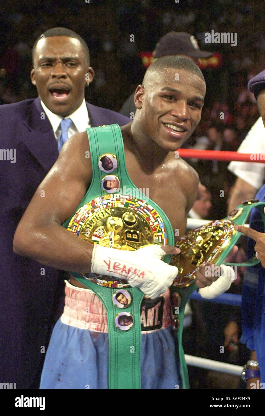 WBC Lightweight Champion, FLOYD MAYWEATHER, holds his belt after ...