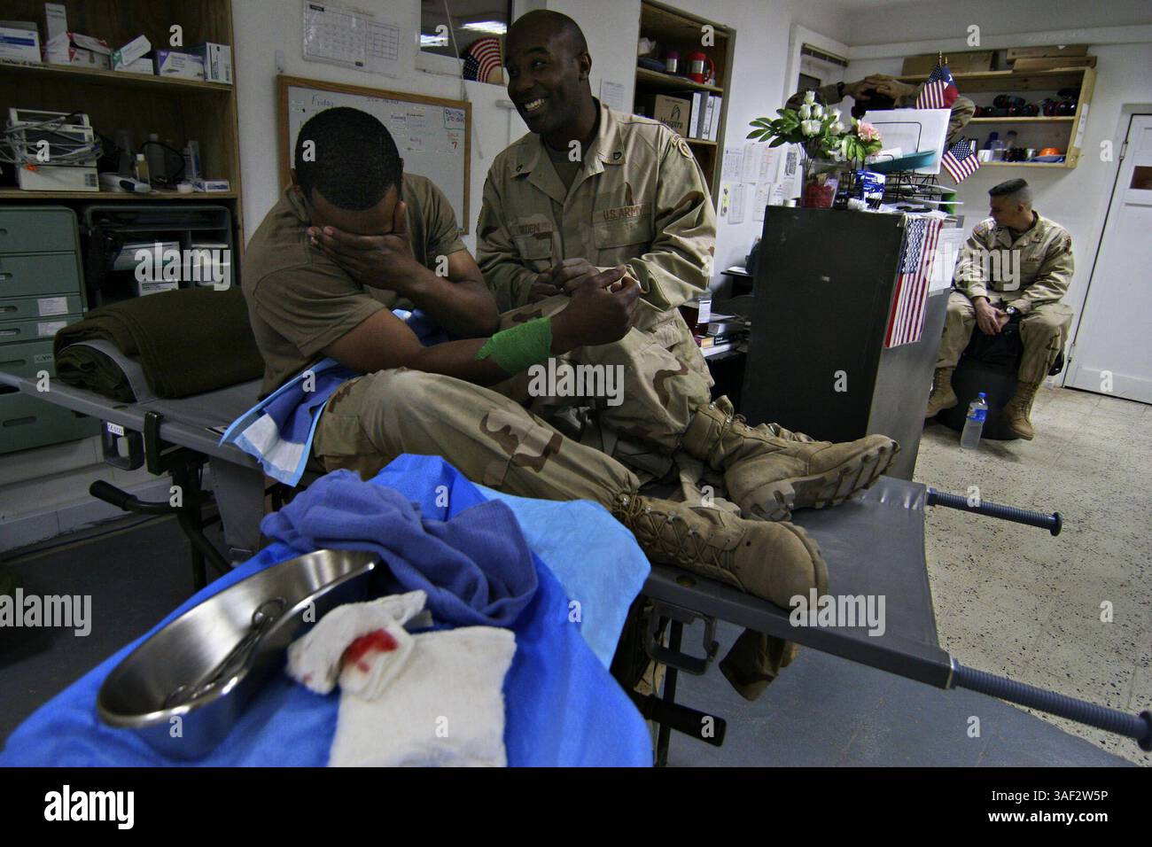 Oct 07, 2005; Tikrit, IRAQ; Spc. WADE LEATHERS, JR., left, and Pfc ...