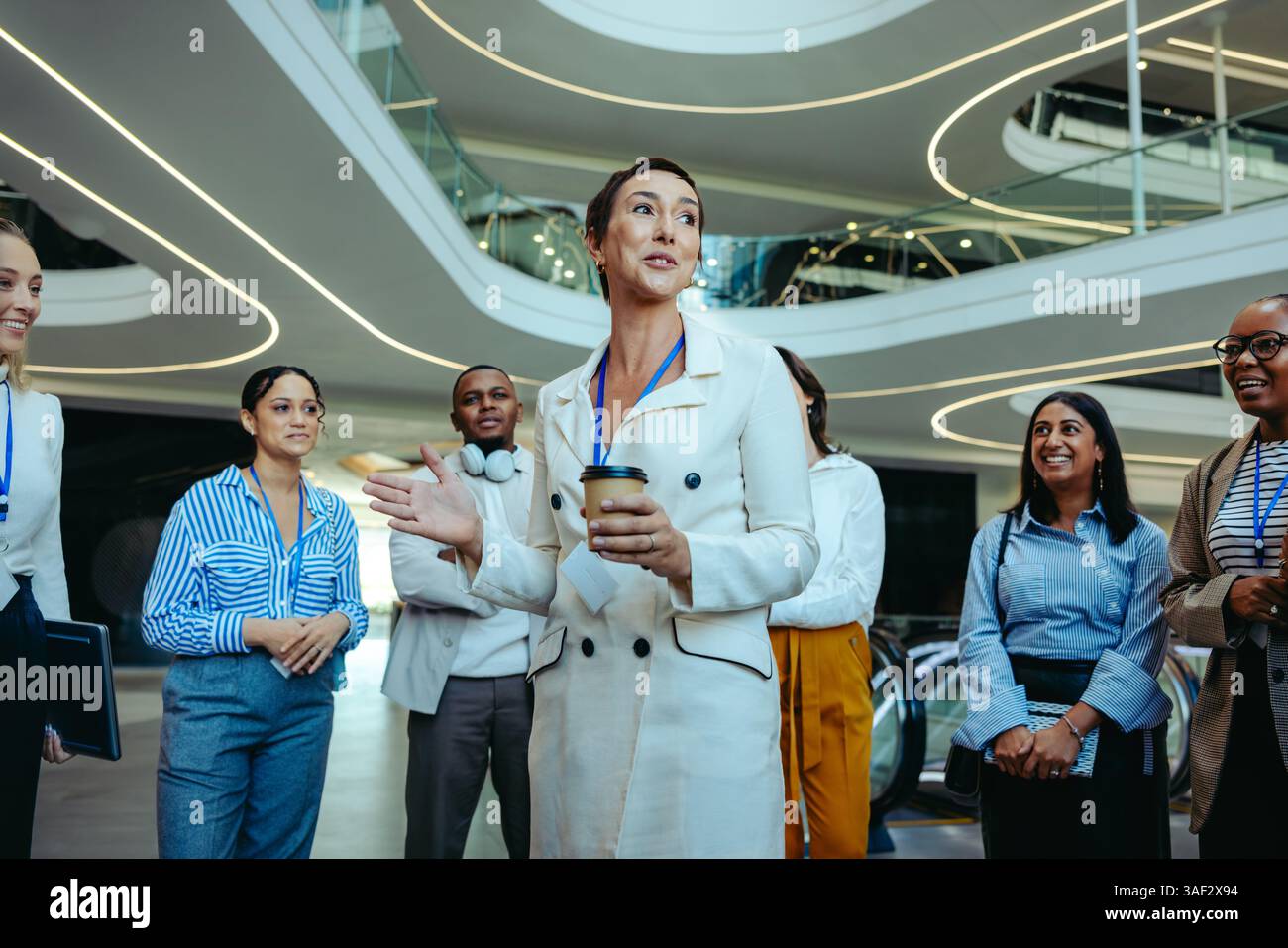 Female manager introduces new recruits at an accounting firm ...