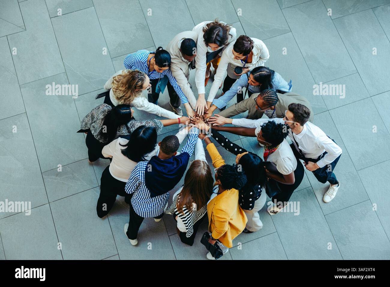 Aerial view of a diverse team of professionals collaborating and ...