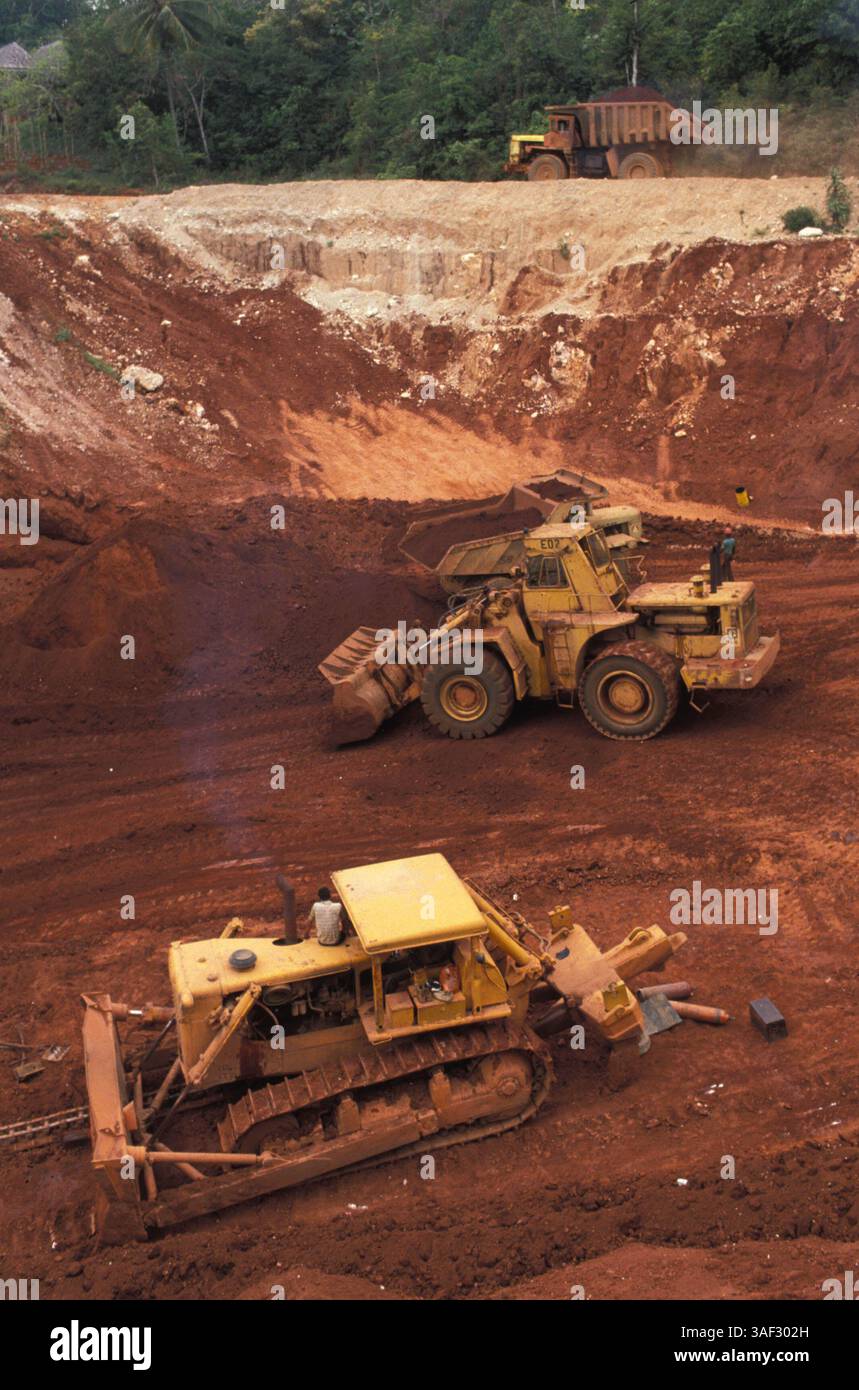 May 20, 1988; Trench Town, JAMAICA ; Giant bulldozers and other heavy ...