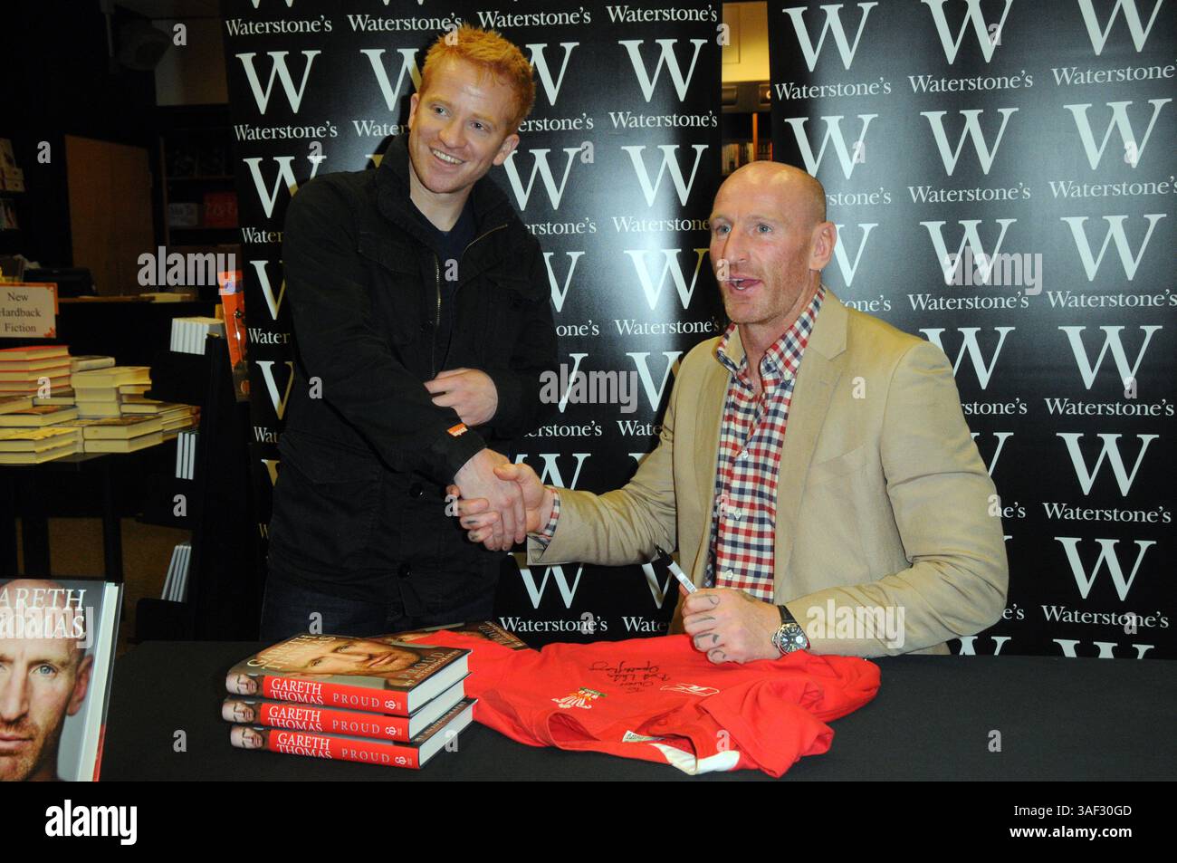 Welsh rugby player Gareth Thomas signs copies of his autobiography ...