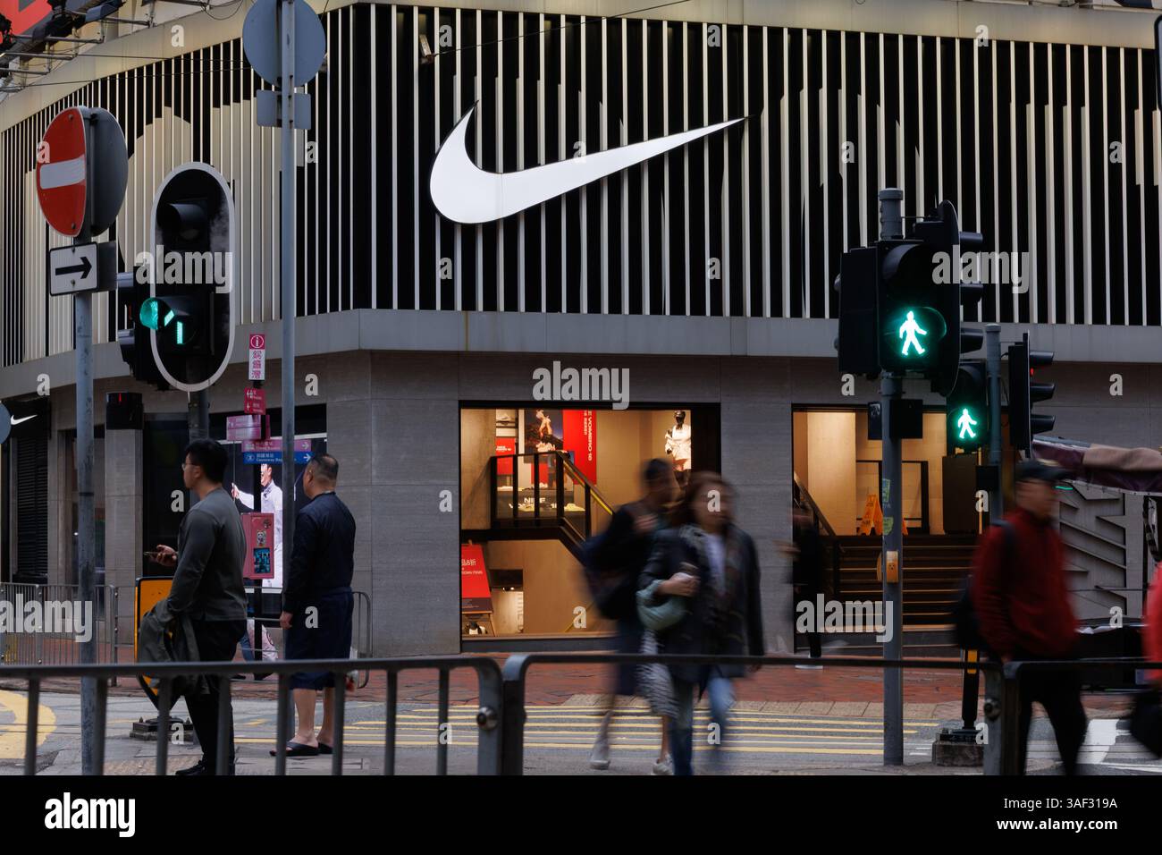 Hong Kong, China. 6th Apr, 2025. People walk pass Nike's store in Hong ...
