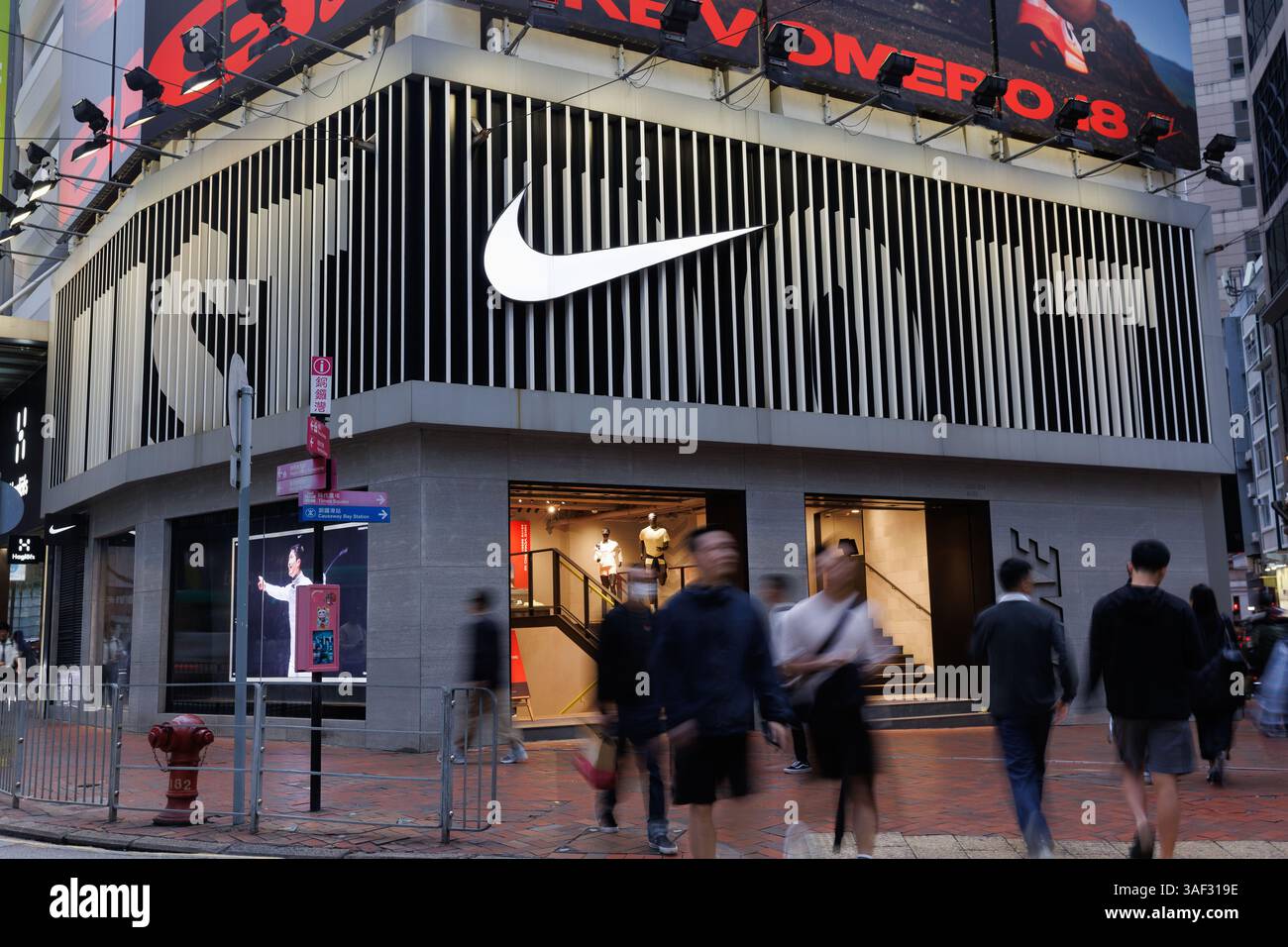 Hong Kong, China. 6th Apr, 2025. People walk pass Nike's store in Hong ...