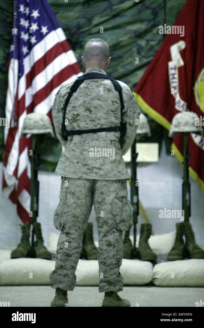 Dec 27, 2004; Camp Abu Ghurab, Iraq; A U.S. Marine with Company K, 3rd ...