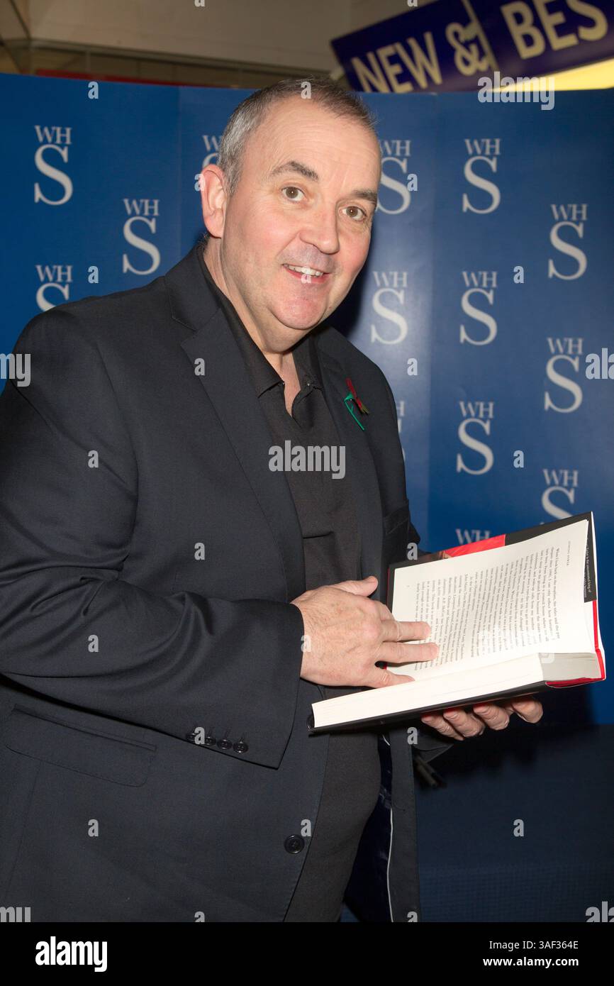 Phil Taylor signs his autobiography at WHSmith Arndale Manchester UK ...