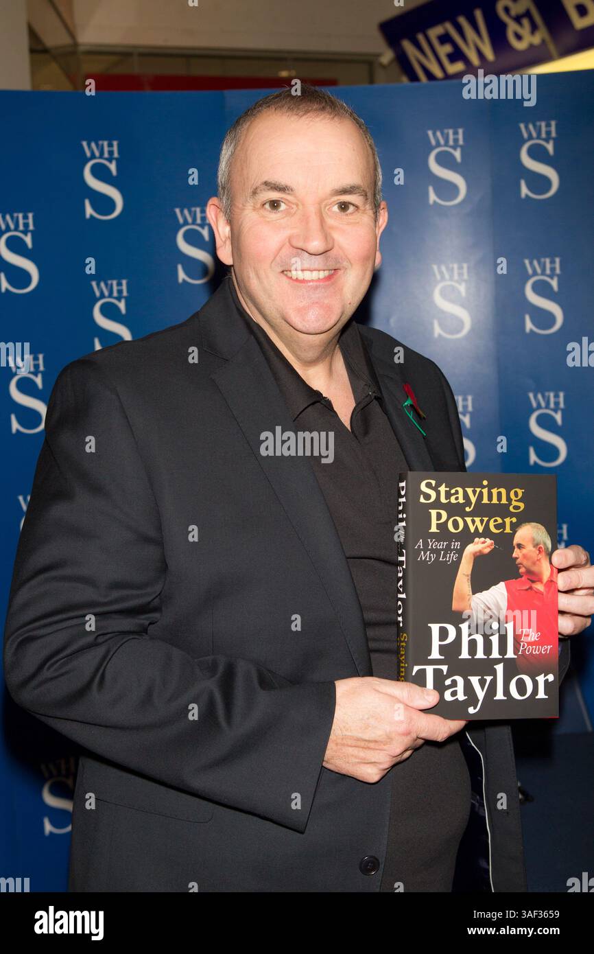 Phil Taylor signs his autobiography at WHSmith Arndale Manchester UK ...