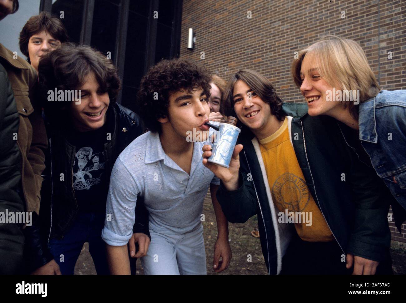 Aug 01, 1977; Boston, MA, USA; High School students smoking out of a ...