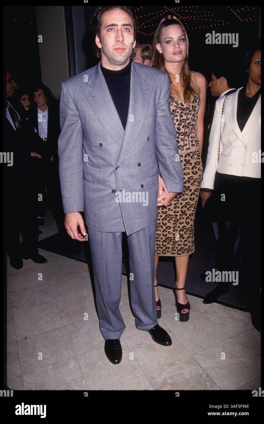 December 15, 1992; Hollywood, CA, USA; Actor NICOLAS CAGE and wife ...