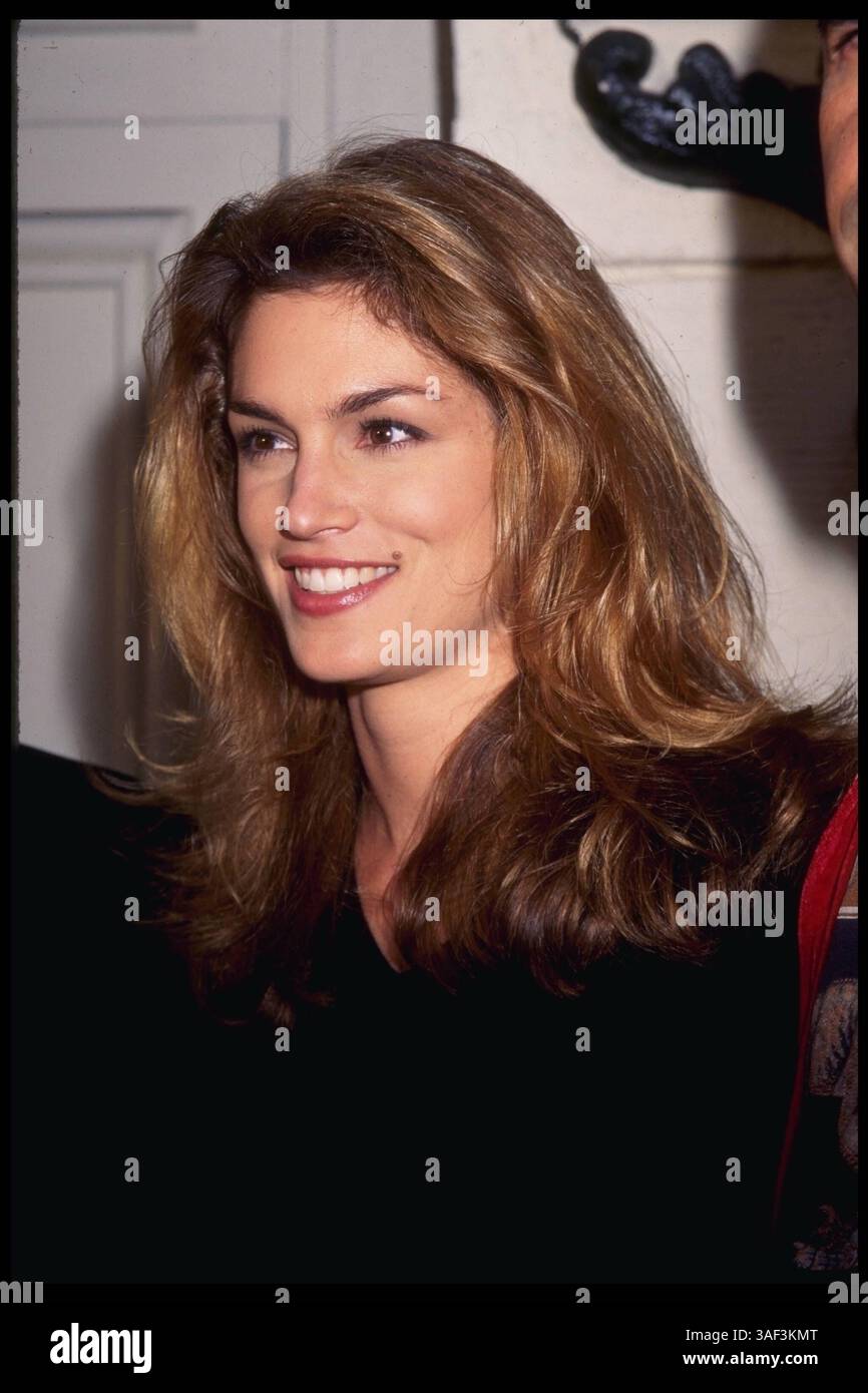 July 27, 1995; Model CINDY CRAWFORD attends the premiere of 'Unzipped ...