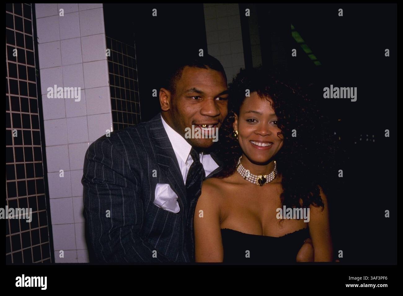 February 1988; MIKE TYSON and wife ROBIN GIVENS are shown together ...