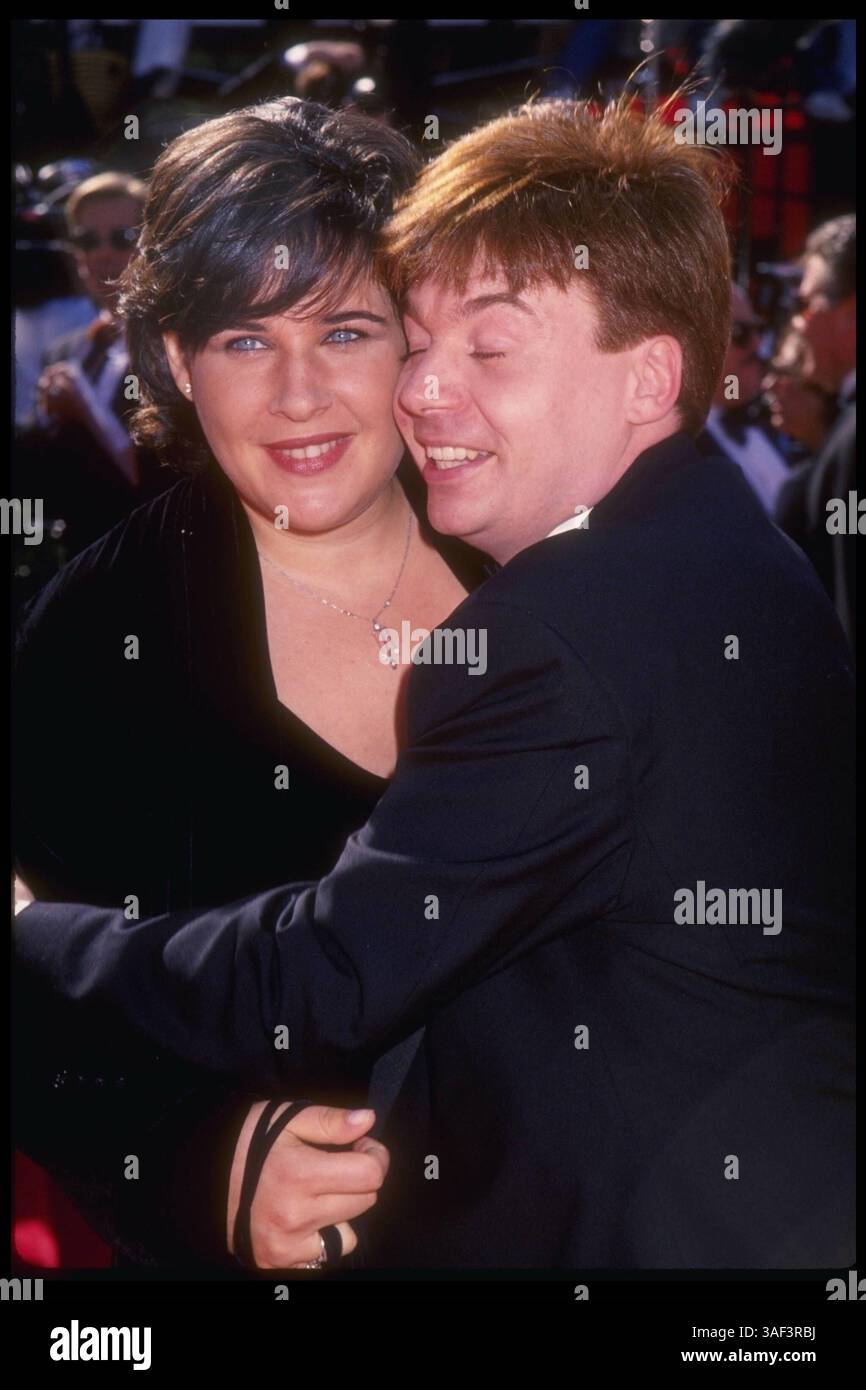 September 11, 1994; Hollywood, CA, USA; MIKE MYERS and his wife ROBIN ...