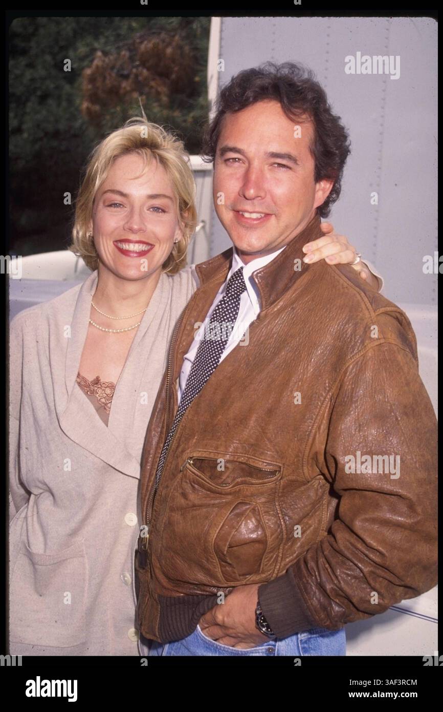 March 28, 1993; Hollywood, CA, USA; SHARON STONE and date BILL McDONALD ...