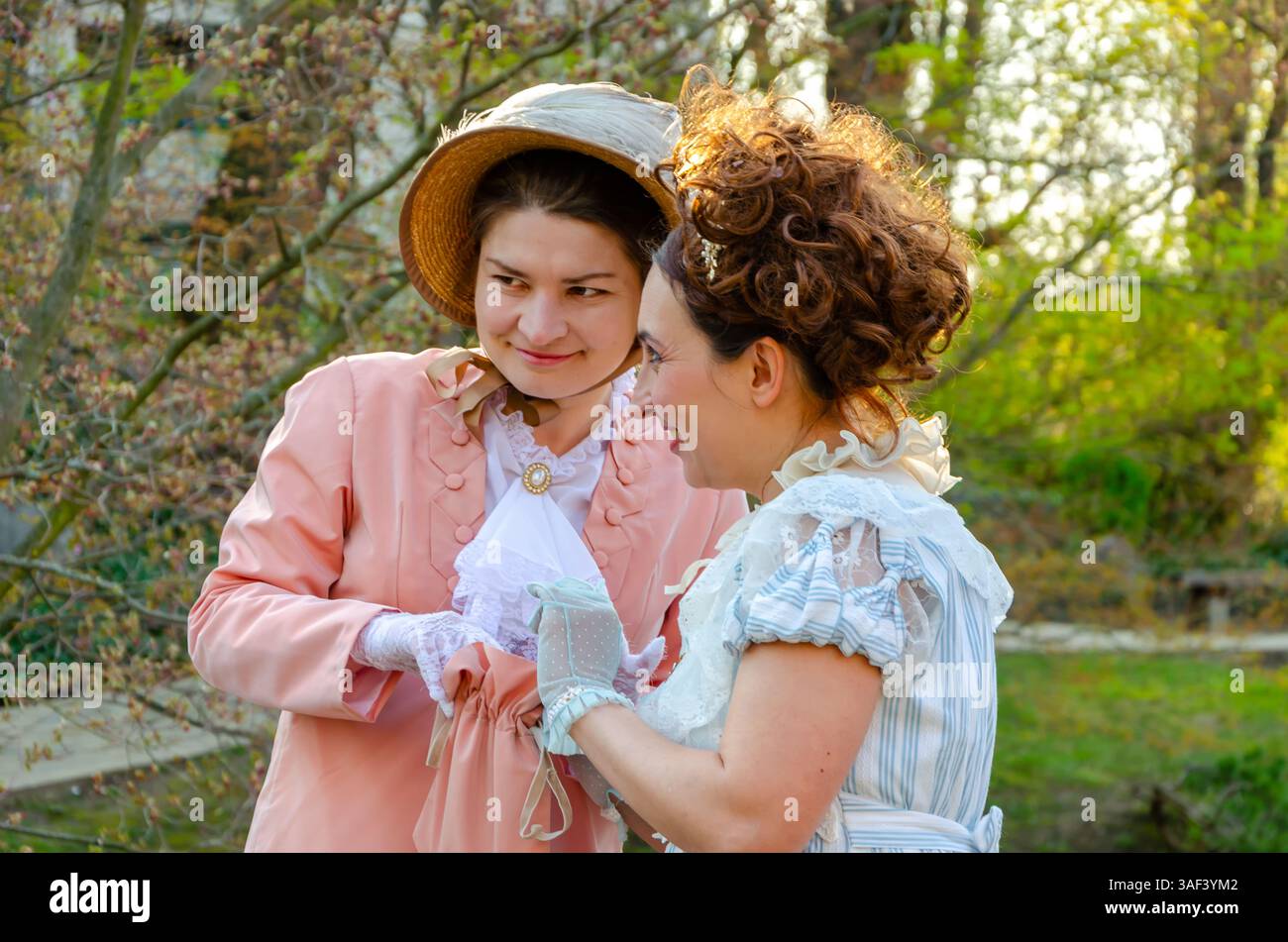 A Regency-era friendly scene of whispers and smiles amidst springtime ...