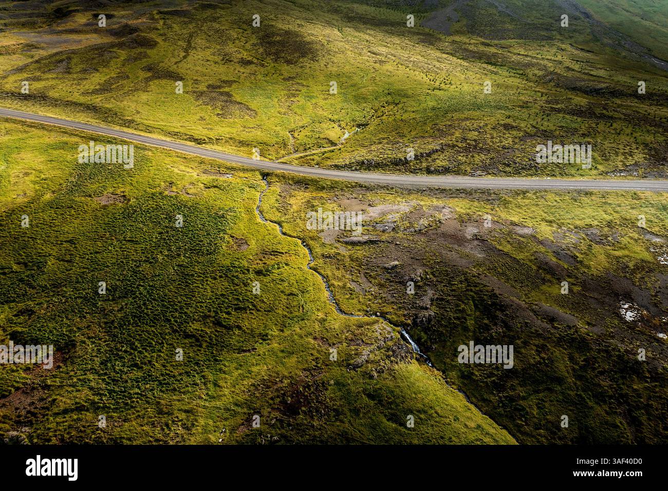 Winding asphalt road through lush hi-res stock photography and images ...