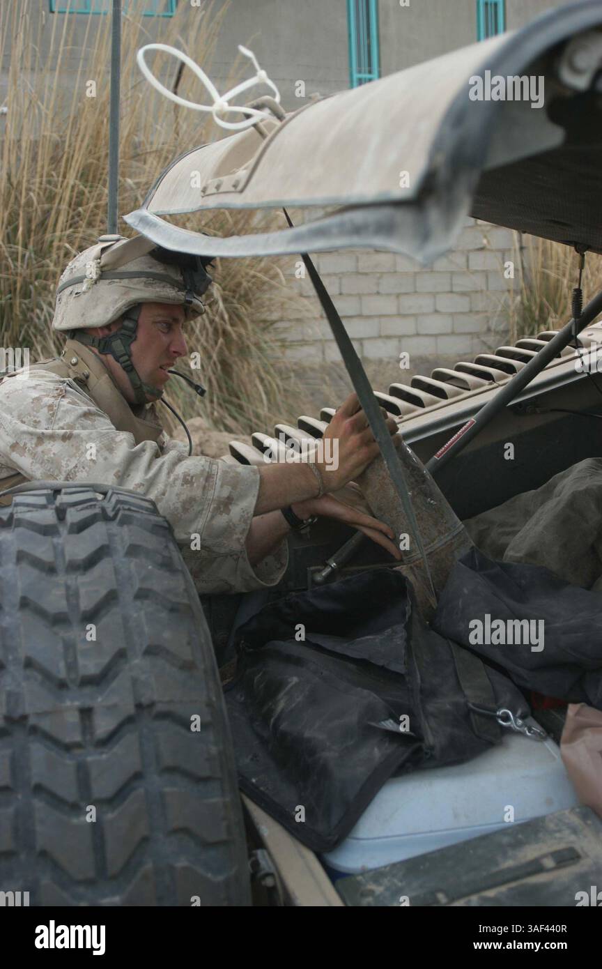 Apr 02, 2005; Ar Ramadi, Iraq; Lance Cpl. RYAN K. JONES, machine gunner ...
