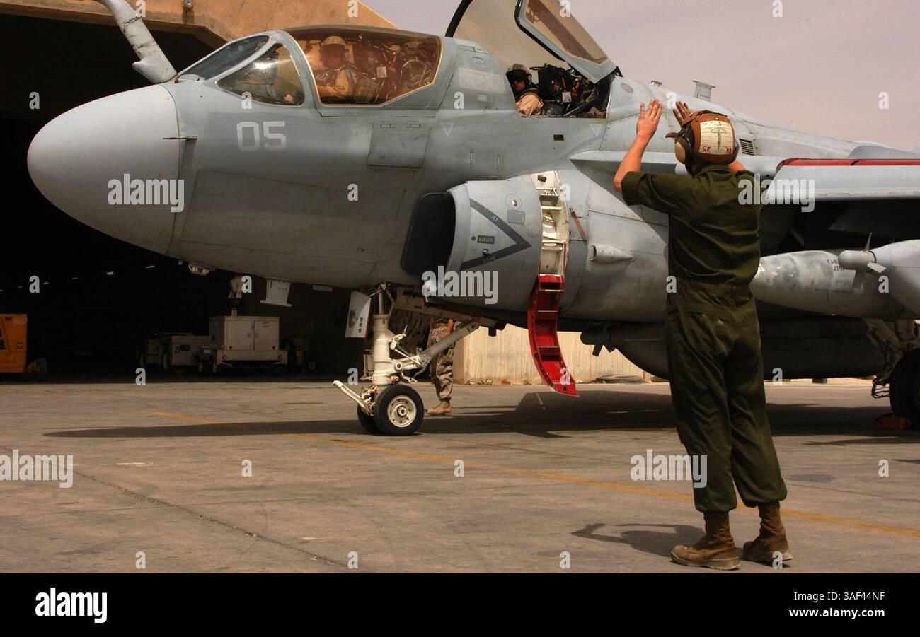 Apr 13, 2005; Al Asad, Iraq; Lance Cpl. MICHAEL D. CLOUSER, plane ...