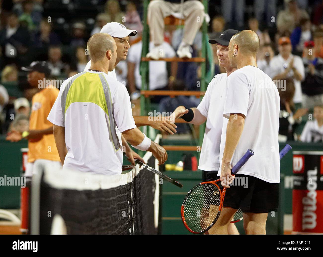 Apr 18, 2005; Houston, TX, USA; ANDRE AGASSI and JIM COURIER (R) shake ...