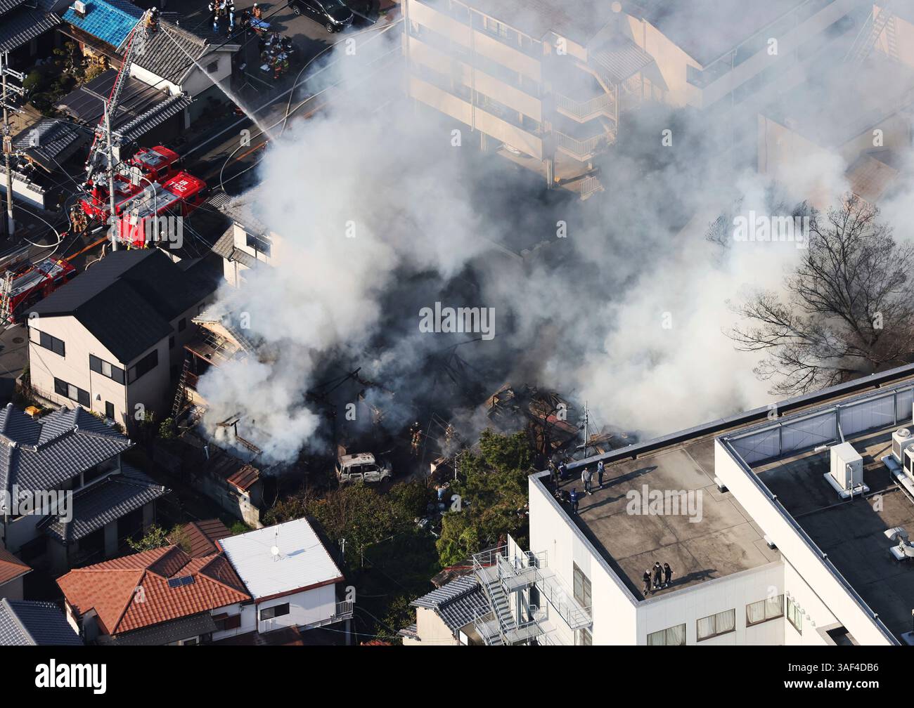 An aerial photo shows a house fire near Minamisakai Hospital in Sakai ...