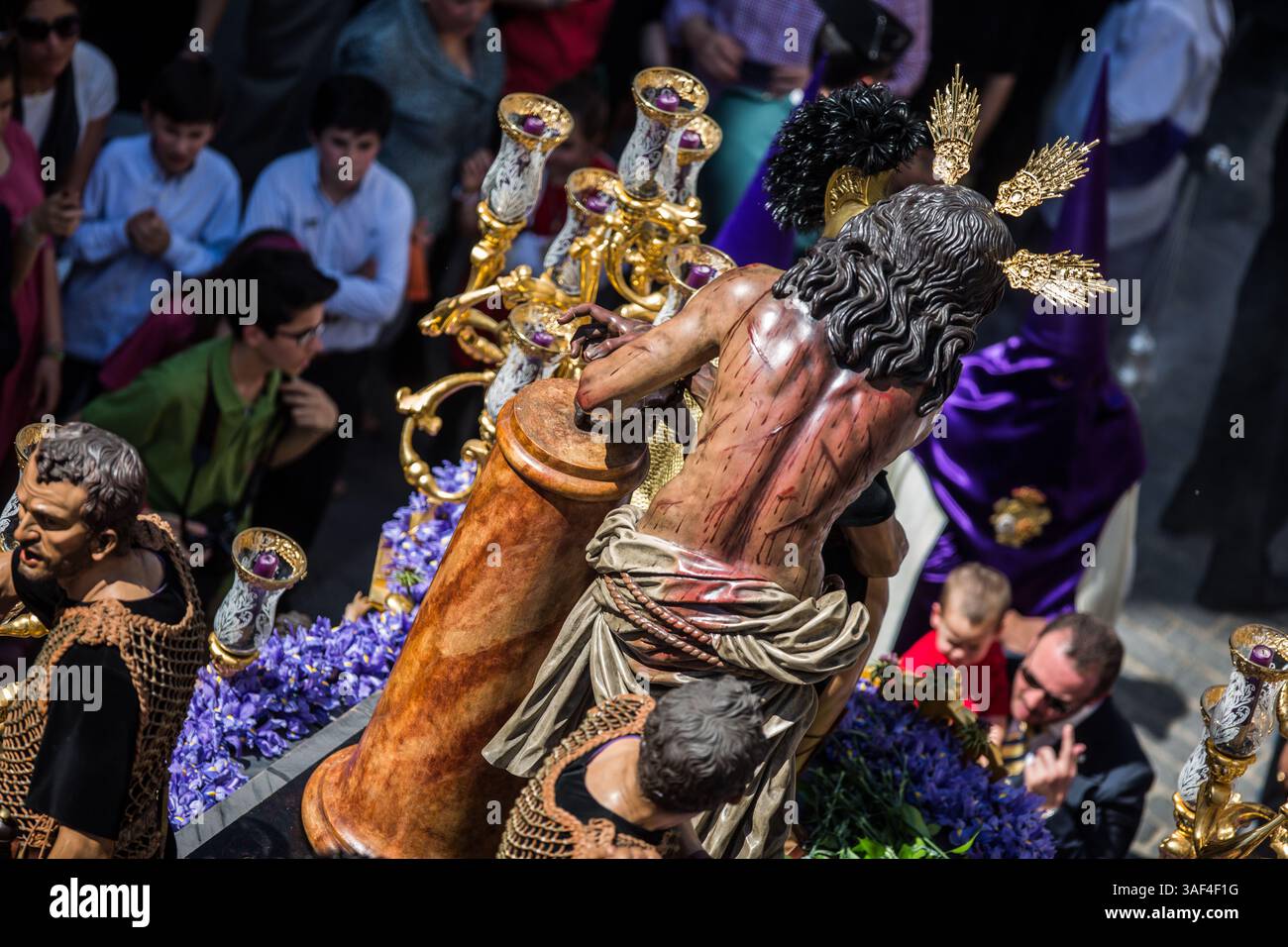 Intricate wooden carving of Jesus Bound to the Column, displayed during ...