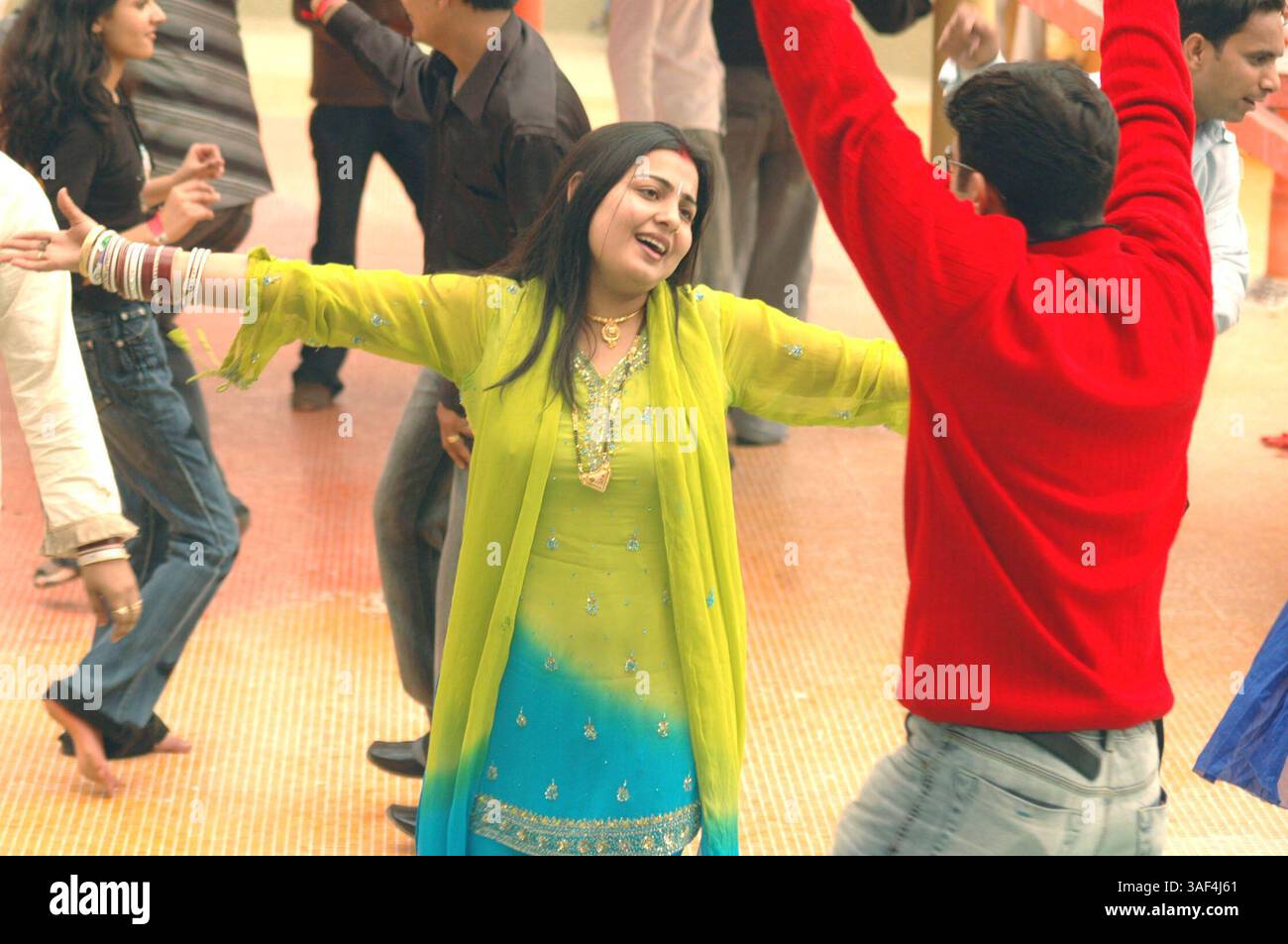 Feb 14, 2005; New Delhi, INDIA; Indian couples dances to celebrate ...